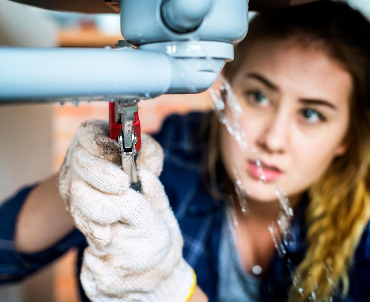Woman Fixing Her Own Toilet Premium Photo Rawpixel woman-fixing-her-own-toilet-premium-photo-rawpixel