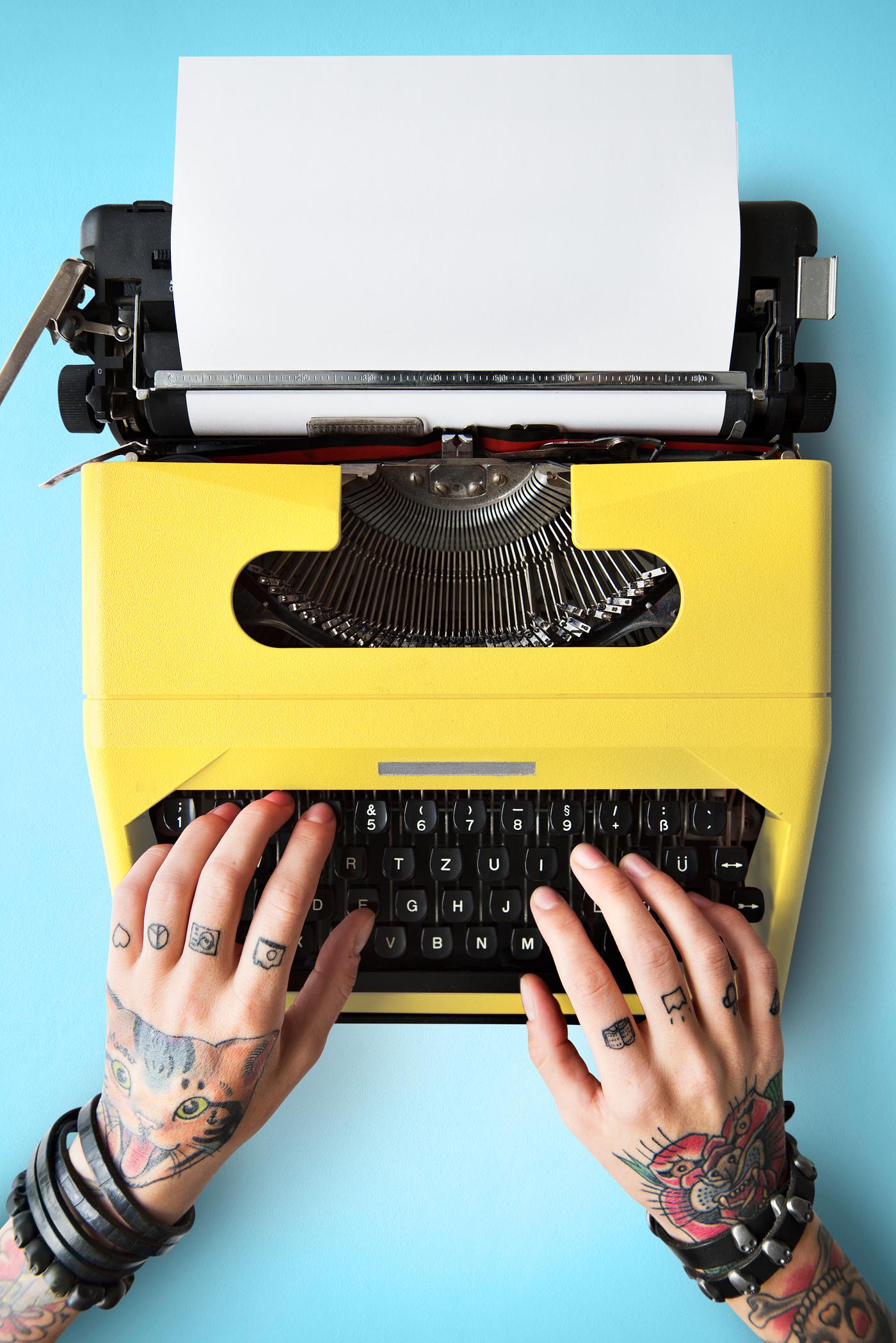 Woman Typing On A Vintage Typewriter Royalty Free Stock Photo 104247 woman-typing-on-a-vintage-typewriter-royalty-free-stock-photo-104247